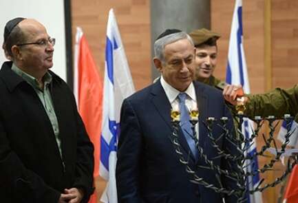 Netanyahu lights Hanukkah candles with elite combat troops