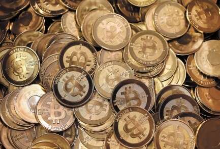 Hacker threatens banks, demands Bitcoins